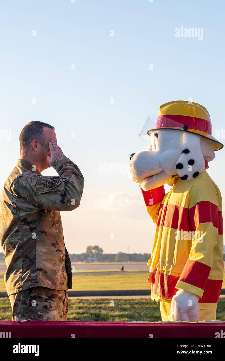 Sparky, mascot of the National Fire Protection Association, salutes U.S ...
