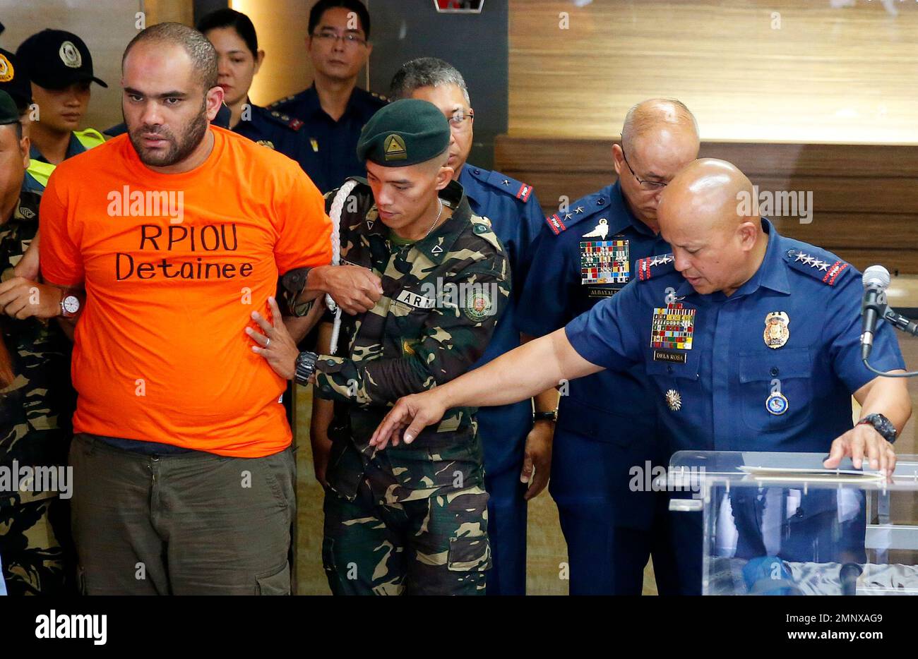 Philippine National Police Chief Gen. Ronald Dela Rosa, right, gestures ...