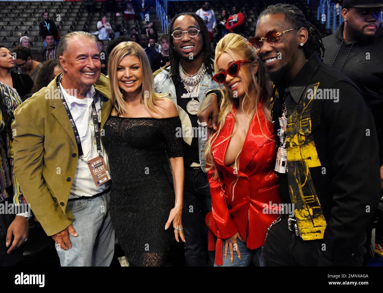 Singer Fergie, second from left, and her father Jon Ferguson, far left ...