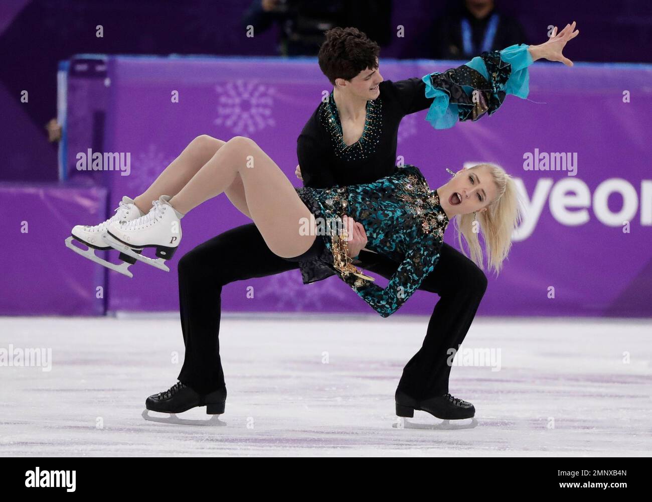 Piper Gilles and Paul Poirier of Canada perform during the ice dance ...