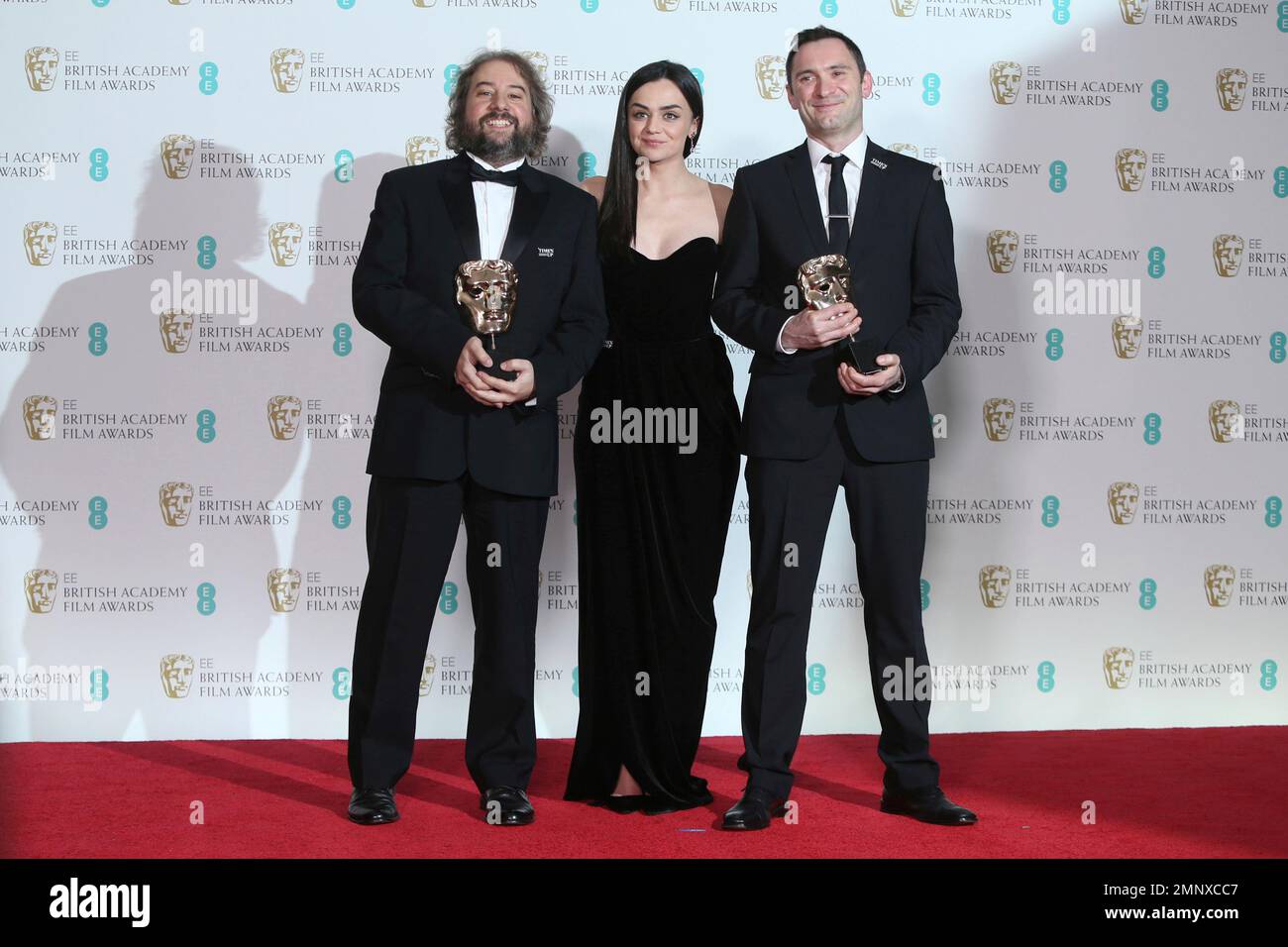 Paul Machliss, left, and Jonathan Amos, right, hold their awards for ...