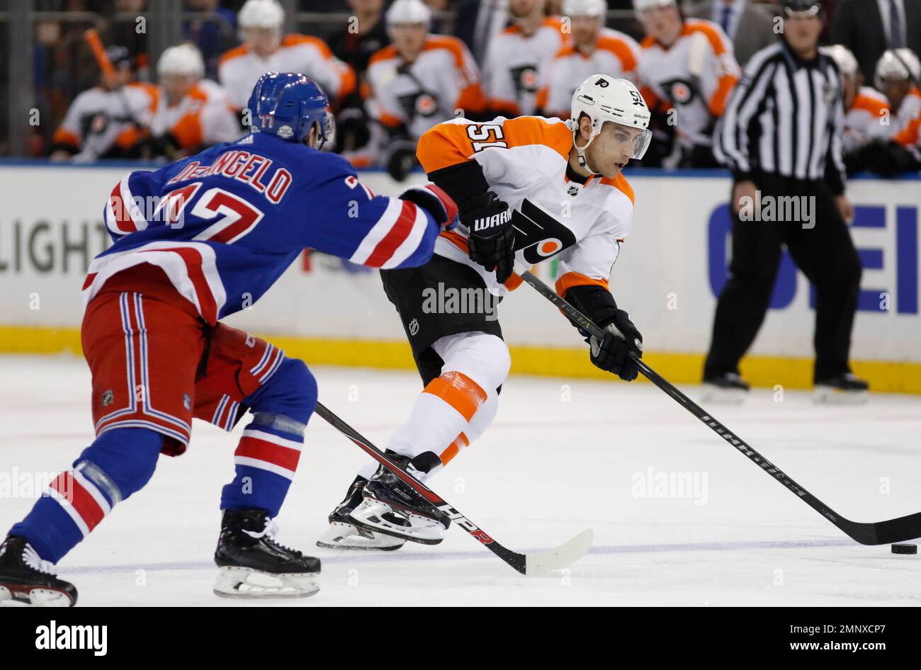 New York Rangers defensman Tony DeAngelo, left, defends Philadelphia ... New York Rangers defensman Tony DeAngelo, left, defends Philadelphia ...