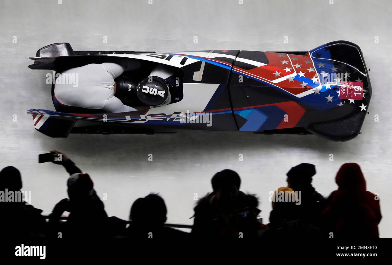 Driver Justin Olsen and Evan Weinstock of the United States take a ...