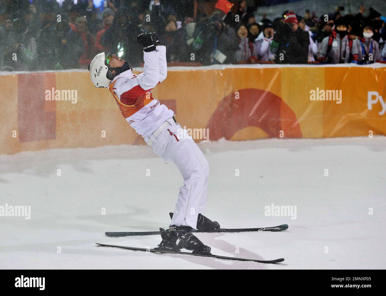 Silver medal winner Jia Zongyang, of China, reacts after his final run ...