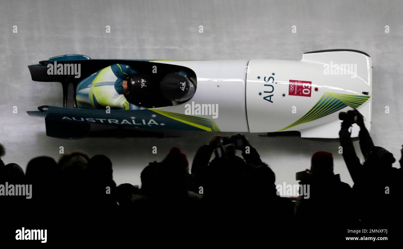 Driver Lucas Mata and David Mari of Australia take a curve during the ...