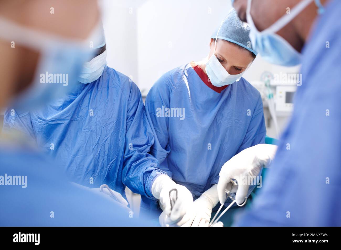 Operating on a patient hi-res stock photography and images - Alamy