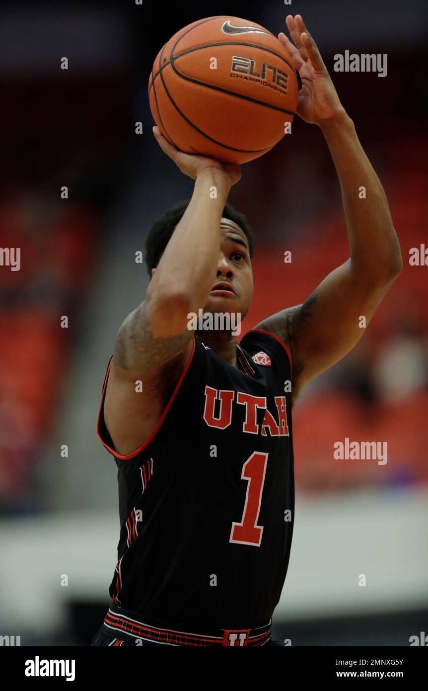 Utah guard Justin Bibbins shoots a free throw during the second half of ...