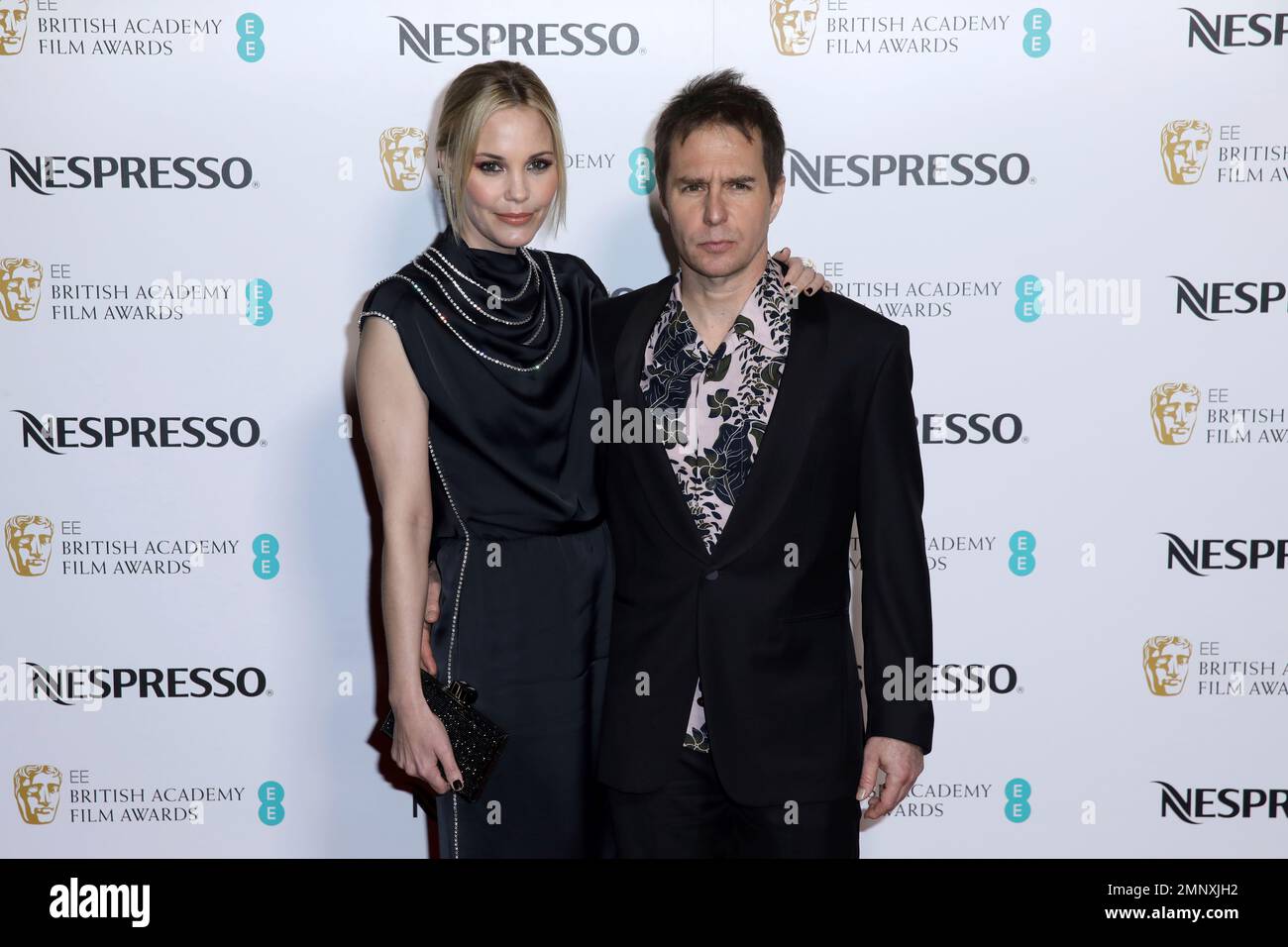 Actors, Sam Rockwell, right, and partner Leslie Bibb pose for ...