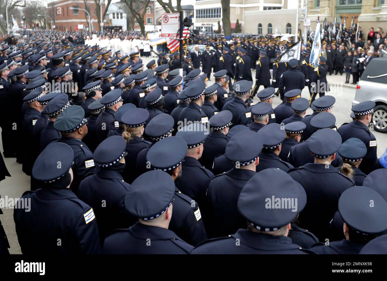 Chicago Police officers from the 18th District stand at attention for ...