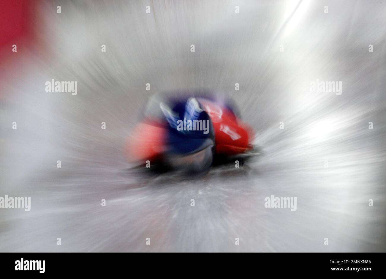 Takako Oguchi, from Japan, competes in her third run during the women's ...