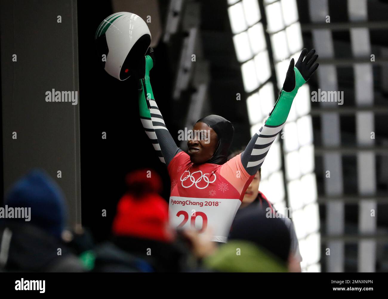 Simidele Adeagbo of Nigeria waves to fans after she finished her third ...