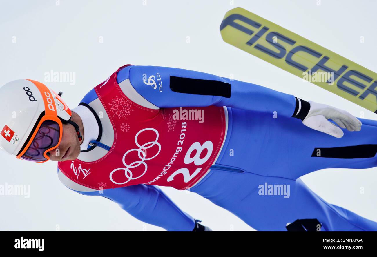 Tim Hug, of Switzerland, jumps during training for the nordic combined ...