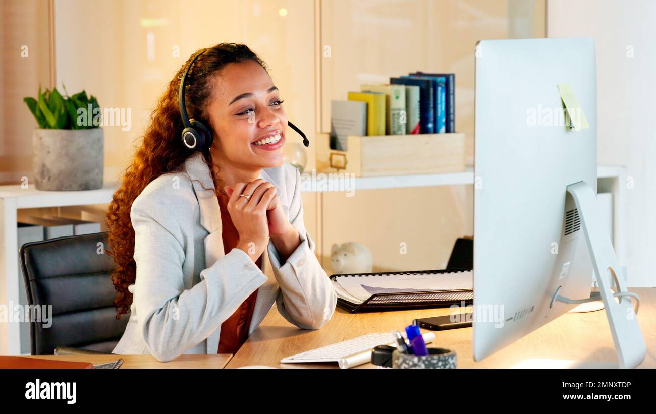 Human resources manager on a video call, waving and smiling at a ...