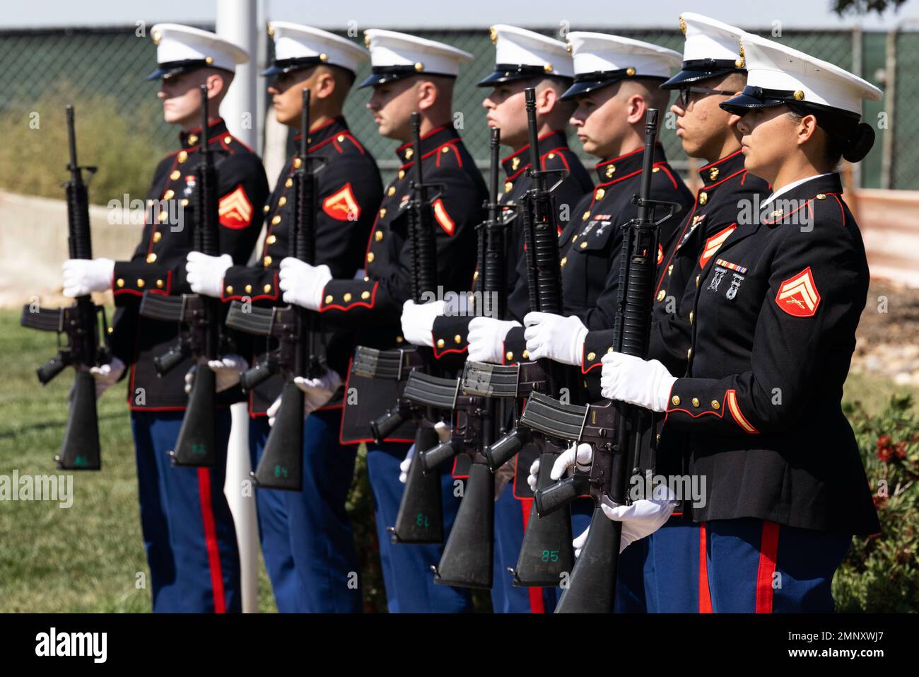 U.S. Marines from 4th Marine Aircraft Wing present arms with the M16-A4 ...