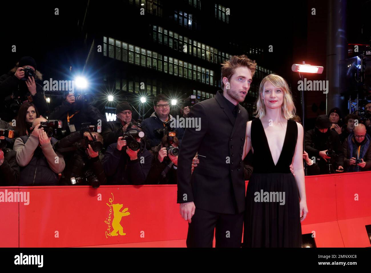 Robert Pattinson, left, and Mia Wasikowska pose at the premier on the ...