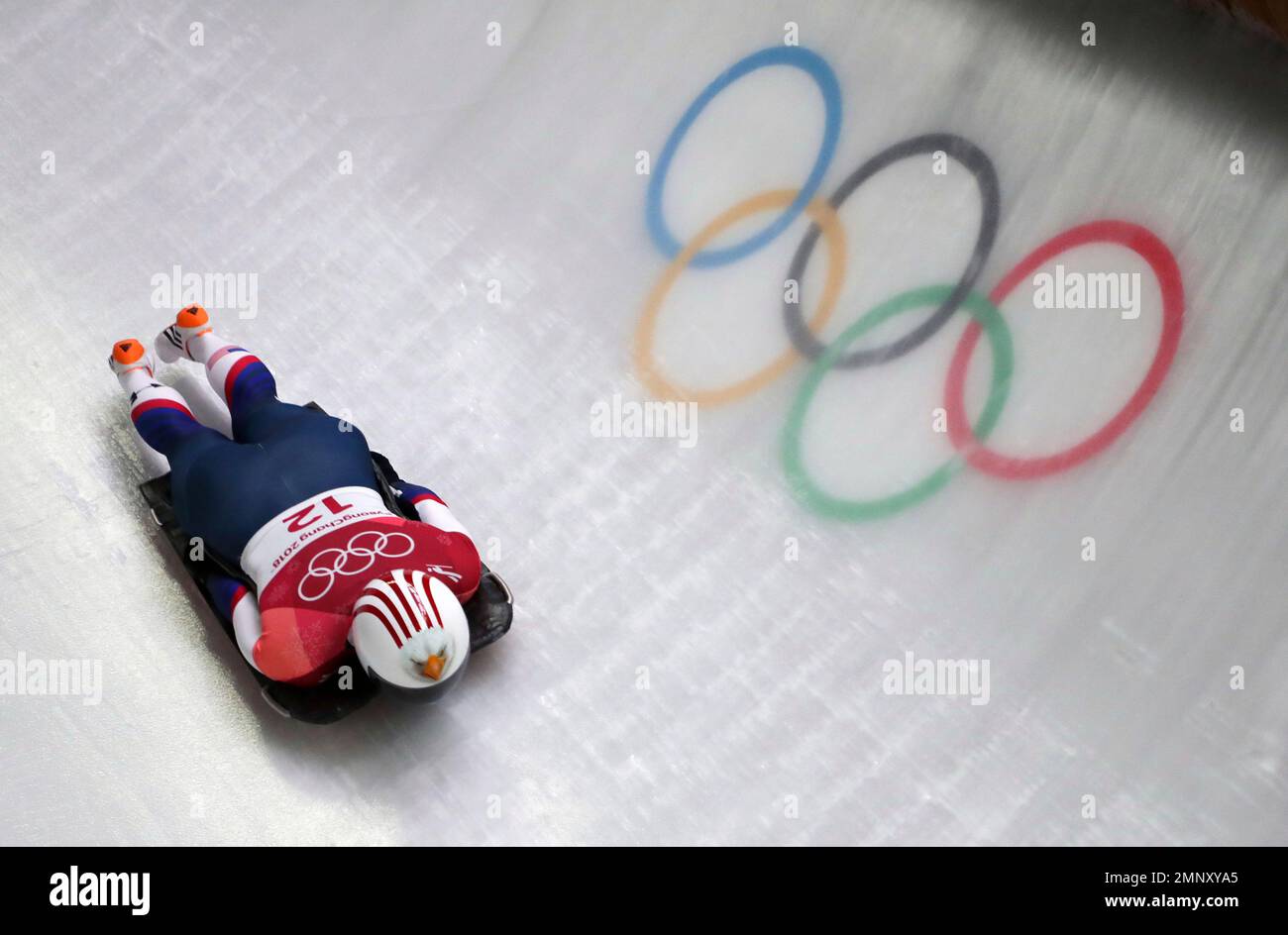 Katie Uhlaender of United States takes a curve on her second run during ...