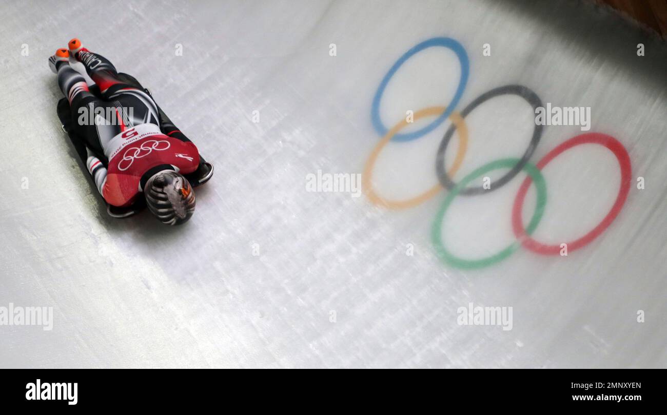 Jane Channell of Canada takes a curve on her second run during the ...