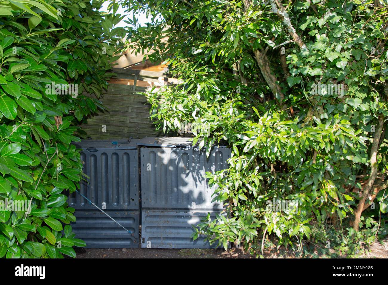 two house compost in the family garden Stock Photo - Alamy