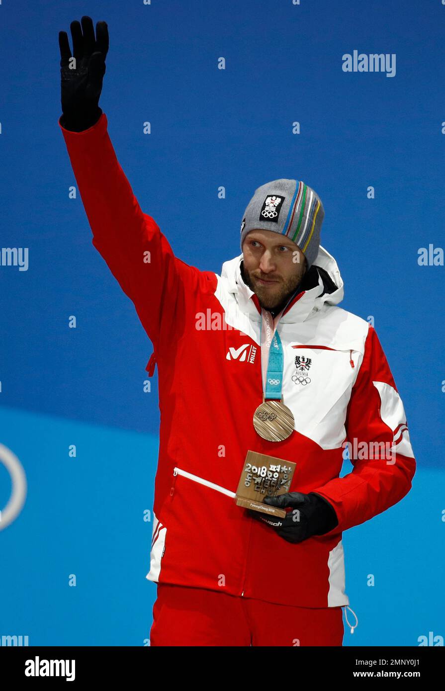 Bronze medalist in the men's 20-kilometer individual biathlon Dominik ...
