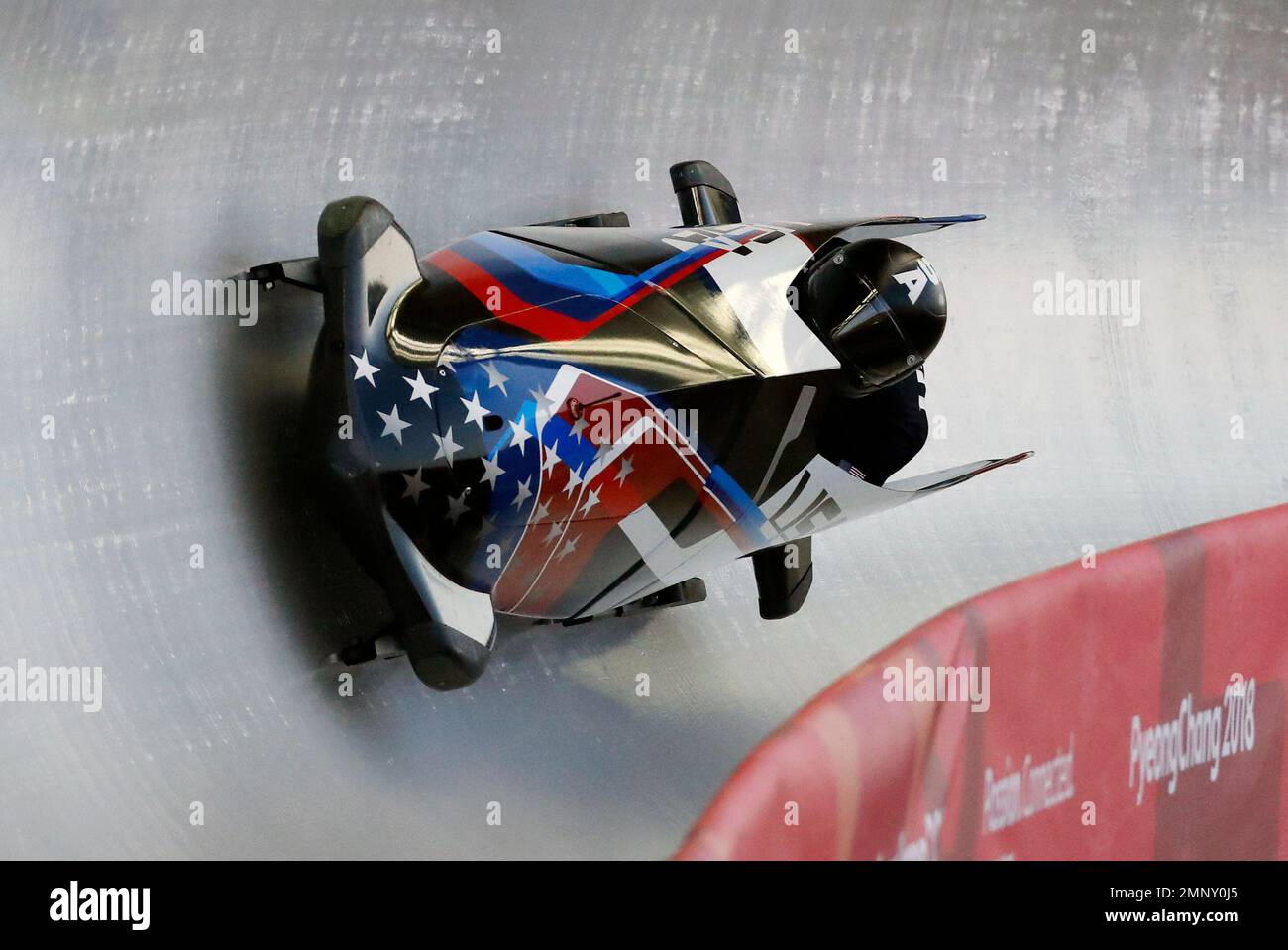 Driver Justin Olsen and Evan Weinstock of the United States take a ...