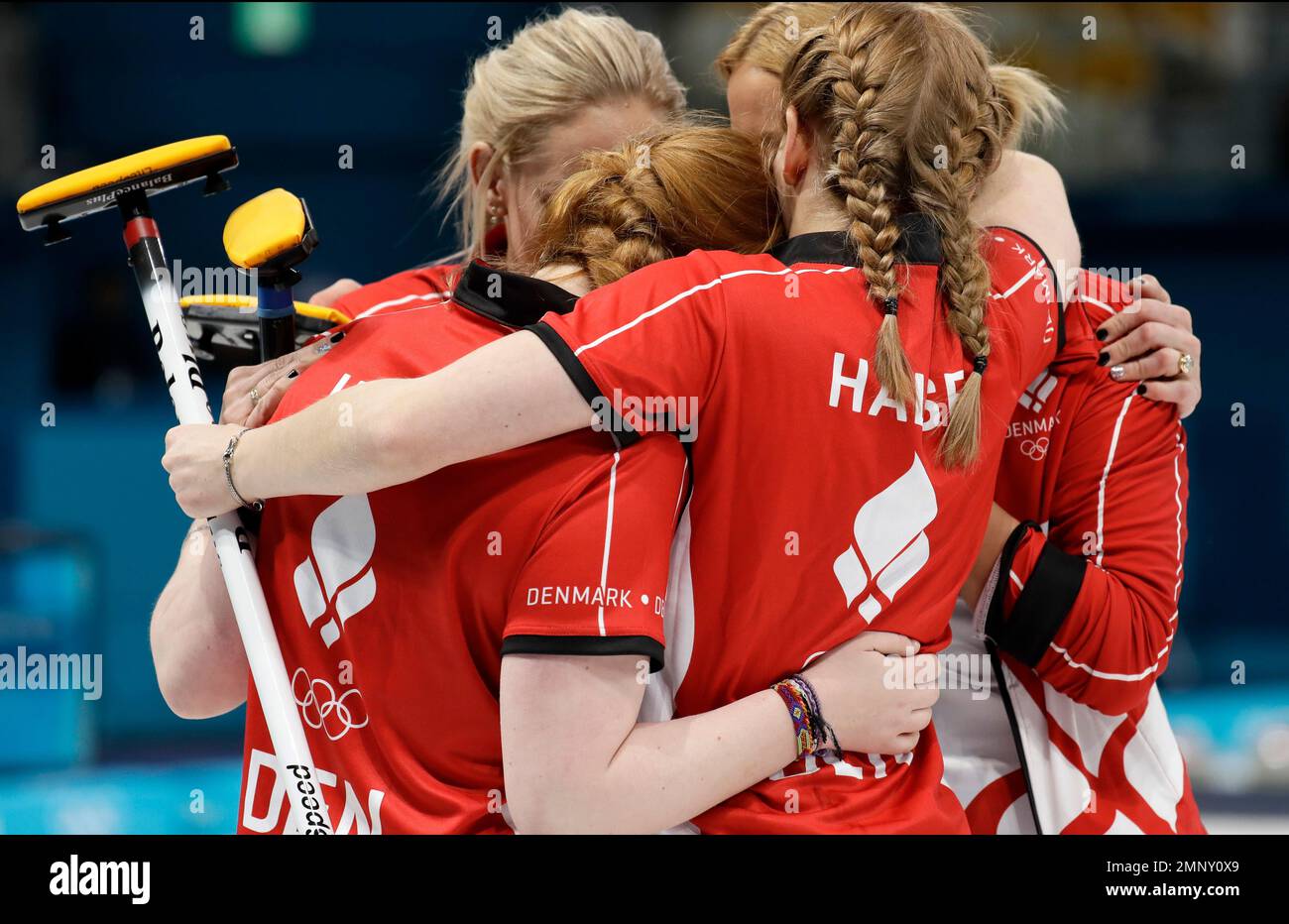 Denmark women's curling team celebrates after beating Canada during ...