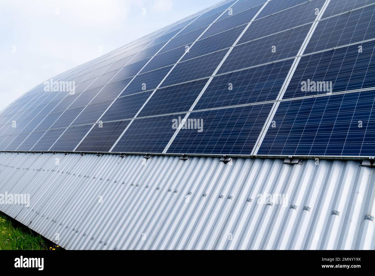 Solar panels panorama sun flare in round industrial building Stock ...