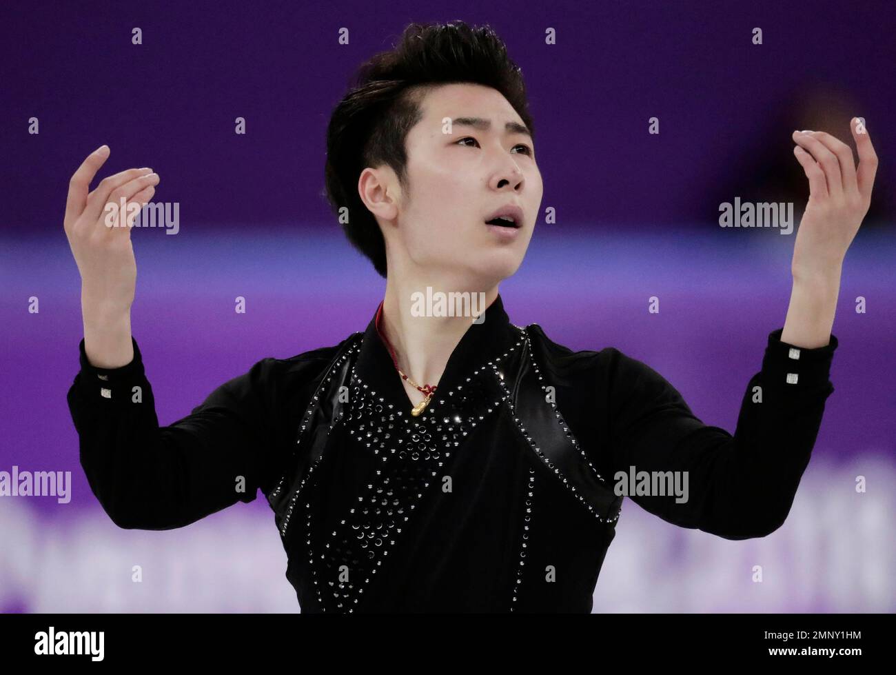 Jin Boyang of China performs during the men's short program figure ...