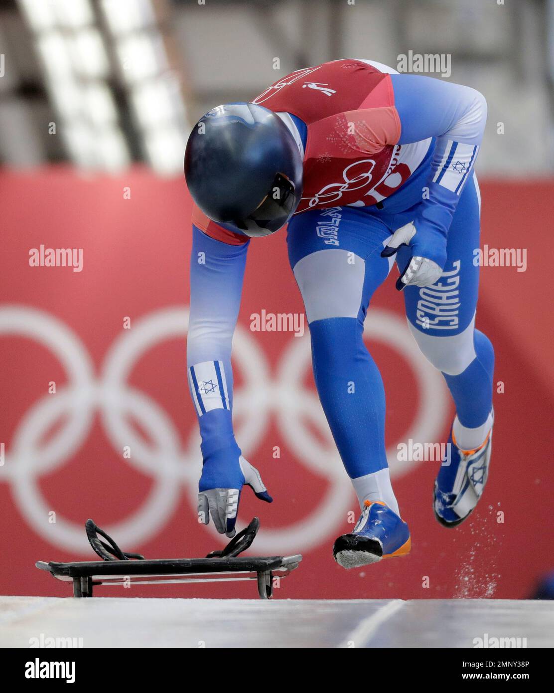 Adam Edelman of Israel starts his third run during the men's skeleton ...