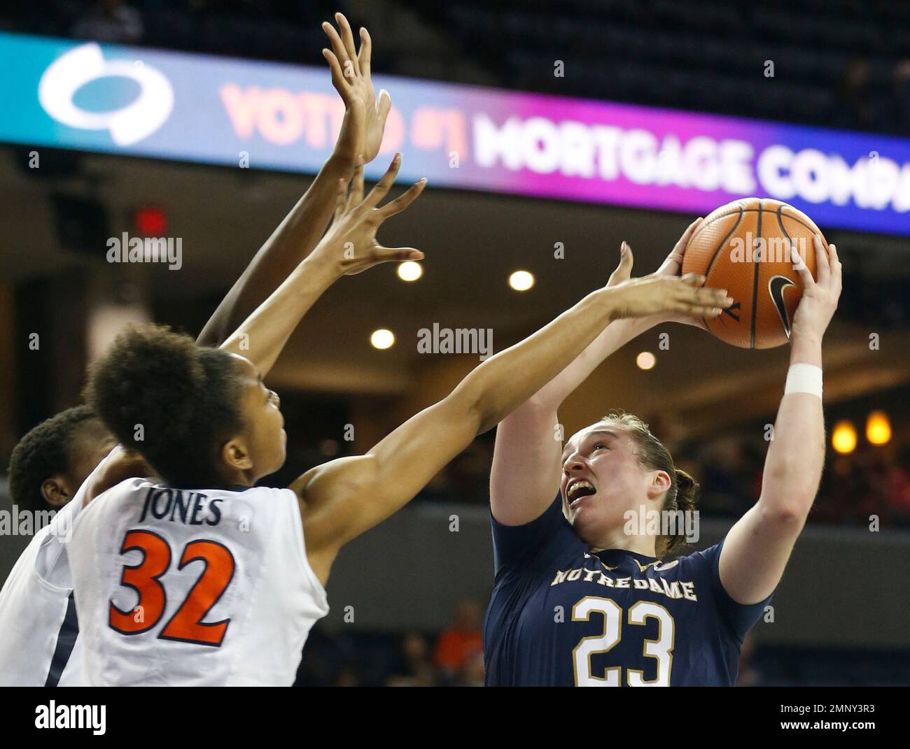 Notre Dame forward Jessica Shepard (23) goes up to shoot as Virginia ...