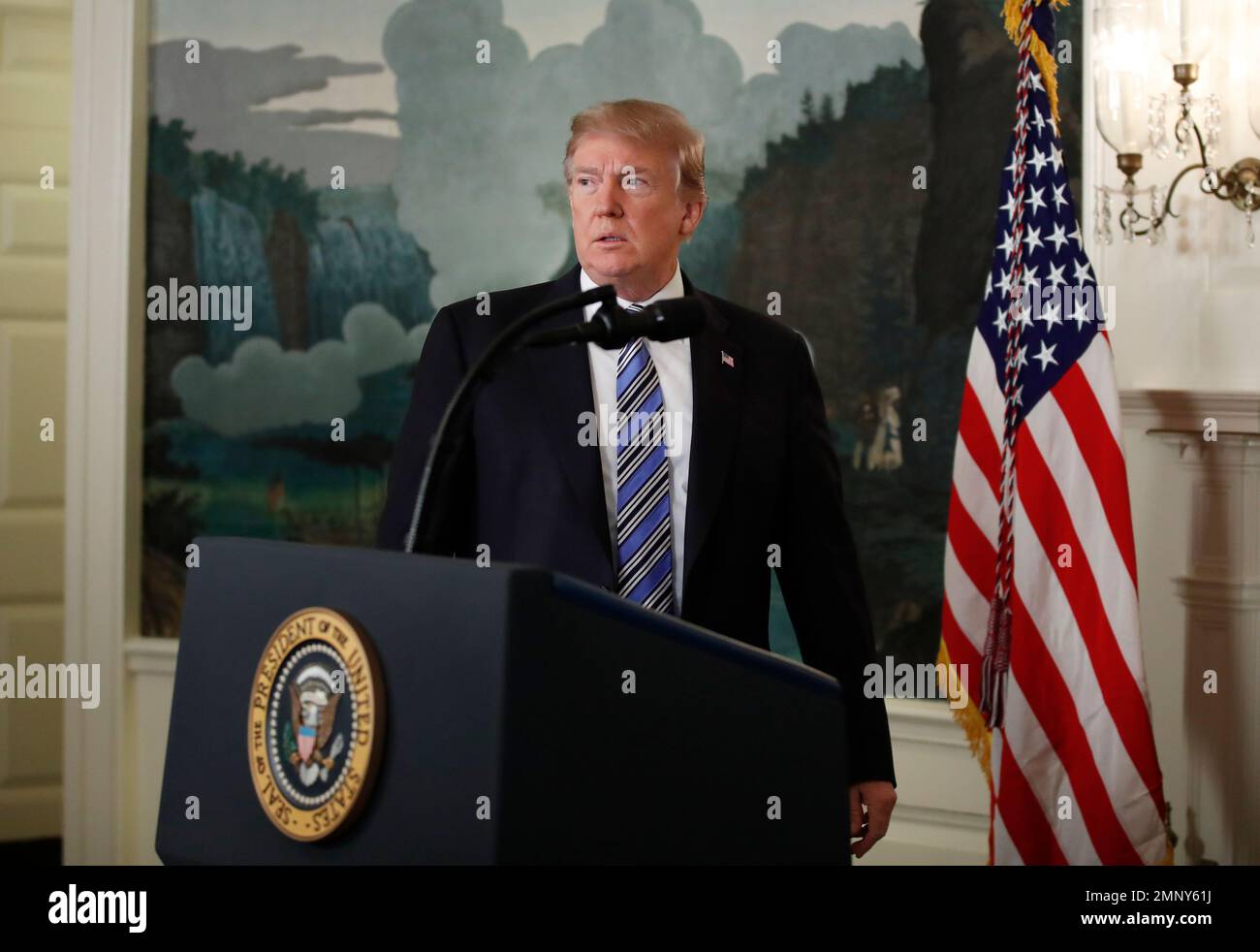 President Donald Trump arrives to speak in the Diplomatic Room of the ...