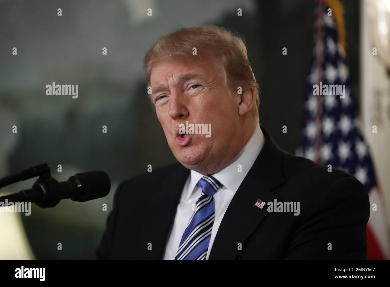 President Donald Trump speaks in the Diplomatic Room at the White House ...