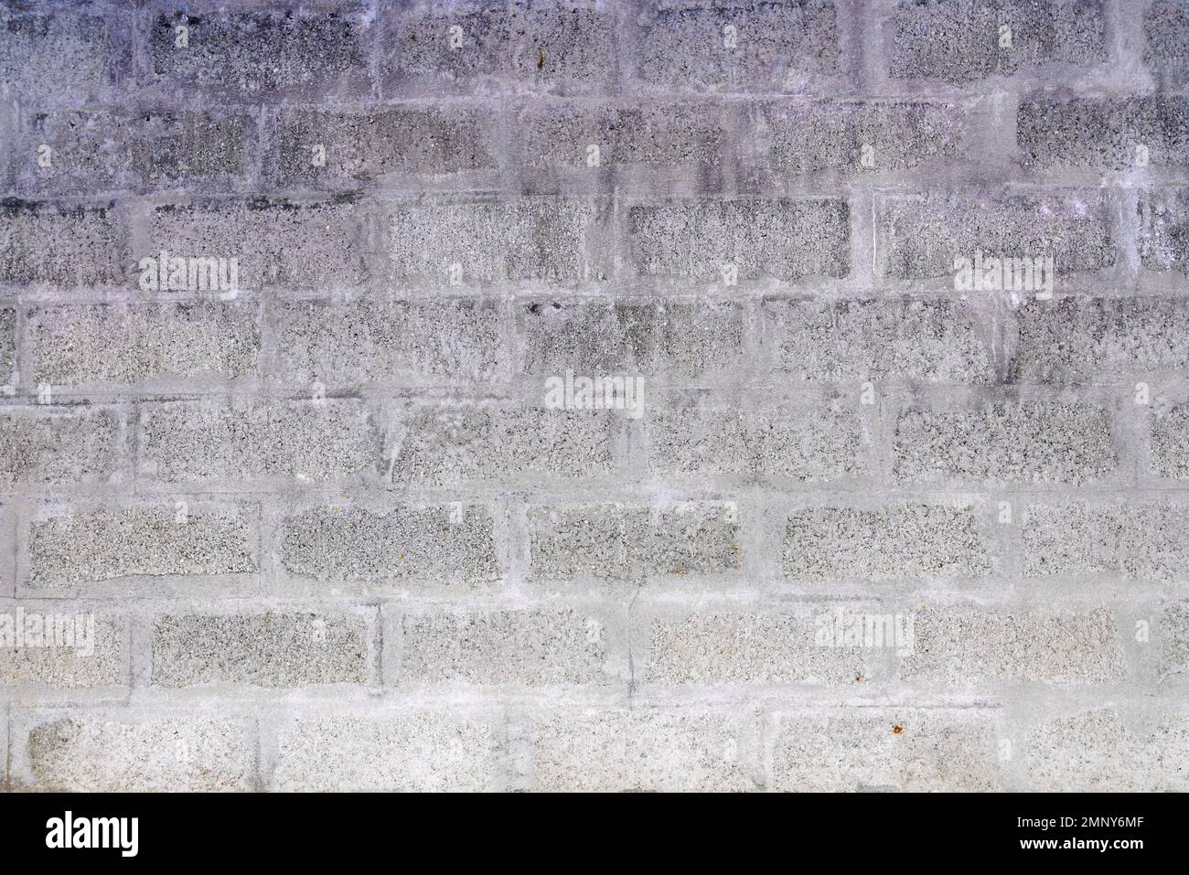 grey cinder block gray wall facade building background Stock Photo - Alamy