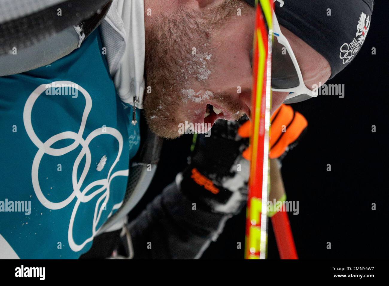 Dominik Landertinger, of Austria, rests in the finish area after the ...