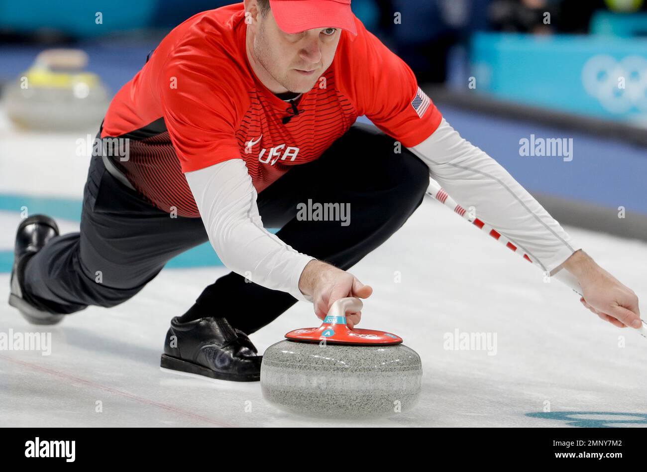 United States's skip John Shuster throws a stone during a men's curling ...