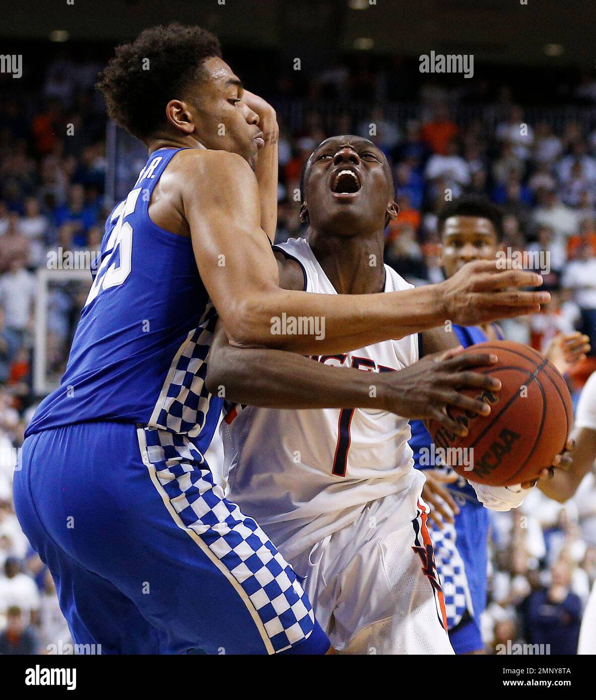 Auburn guard Jared Harper drives to the basket against Kentucky forward ...