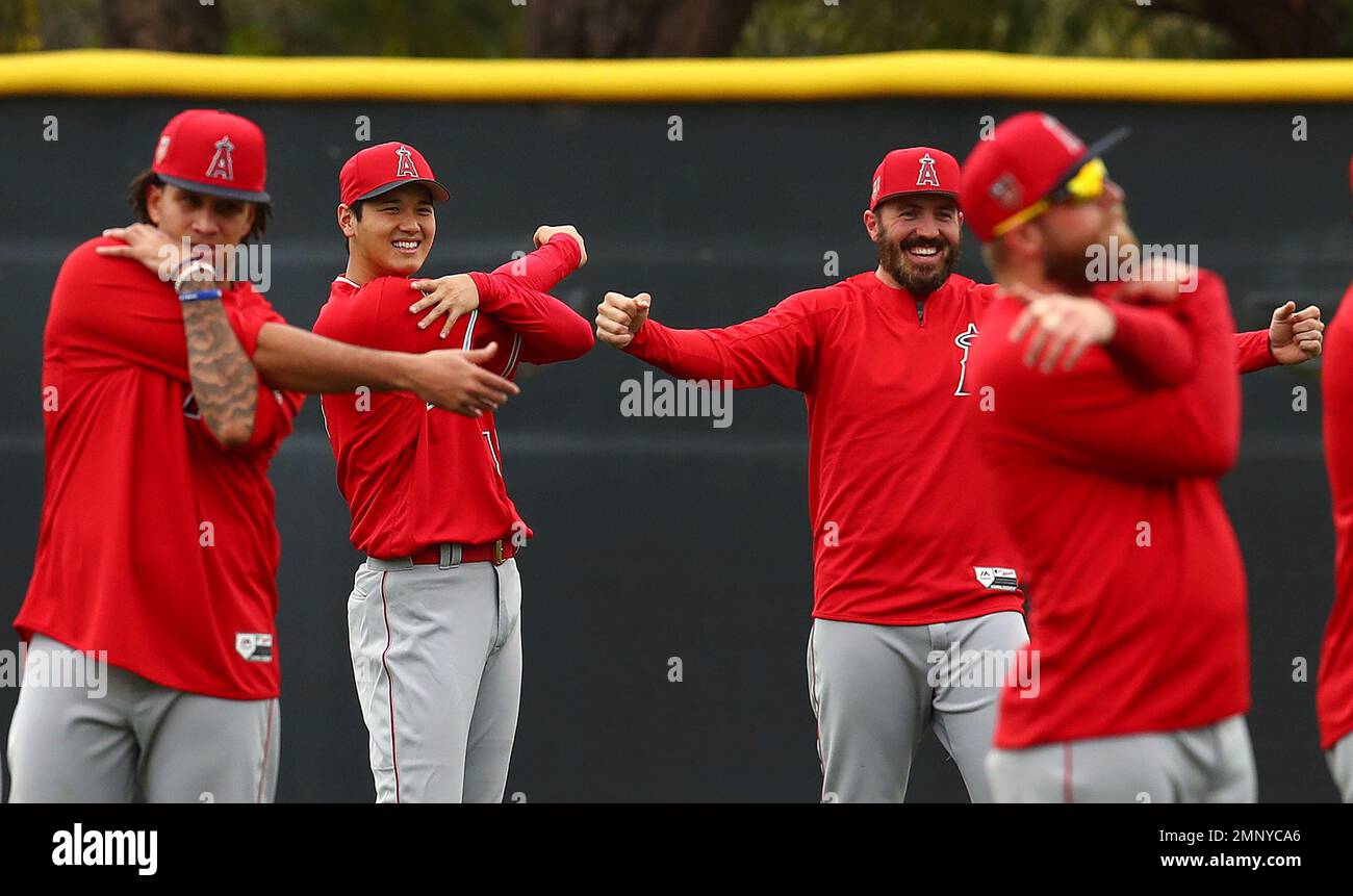 Los Angeles Angels' Shohei Ohtani, second from left, smiles during a ...