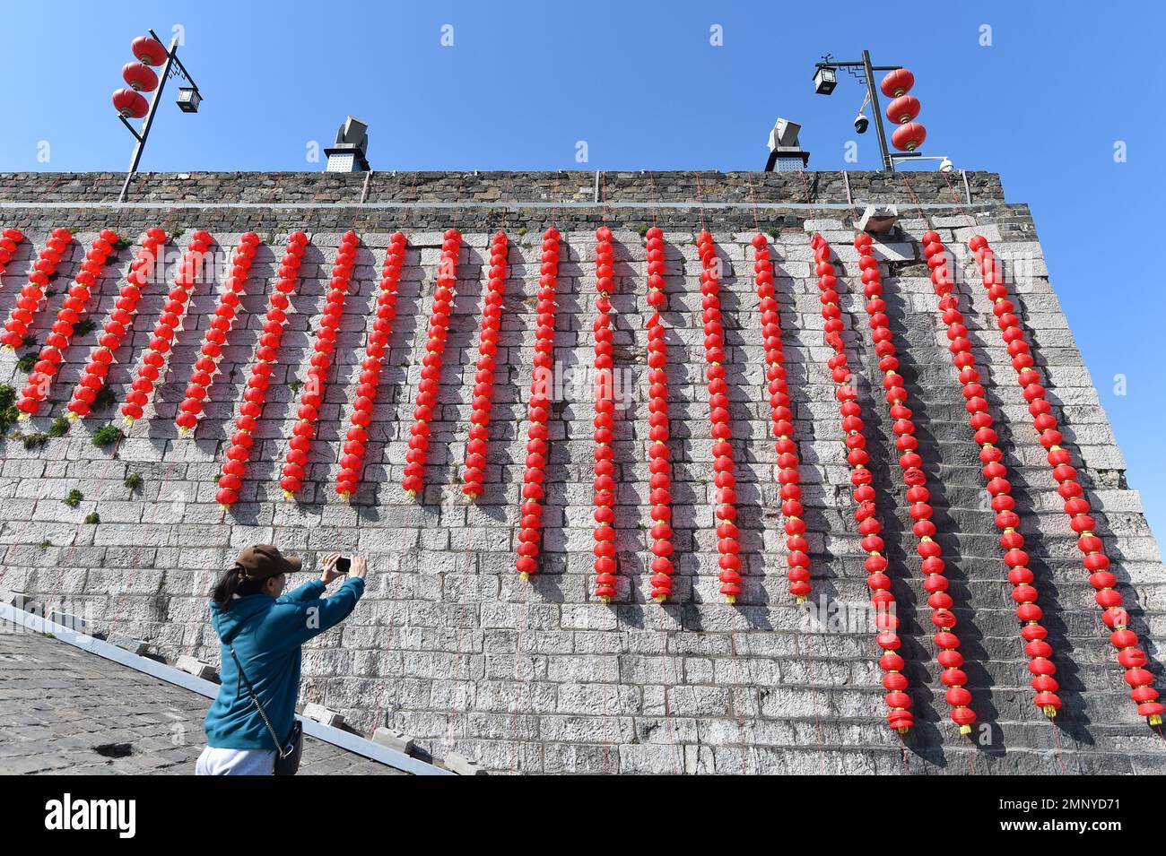 NANJING, CHINA - JANUARY 31, 2023 - Tourists take photos in front of ...