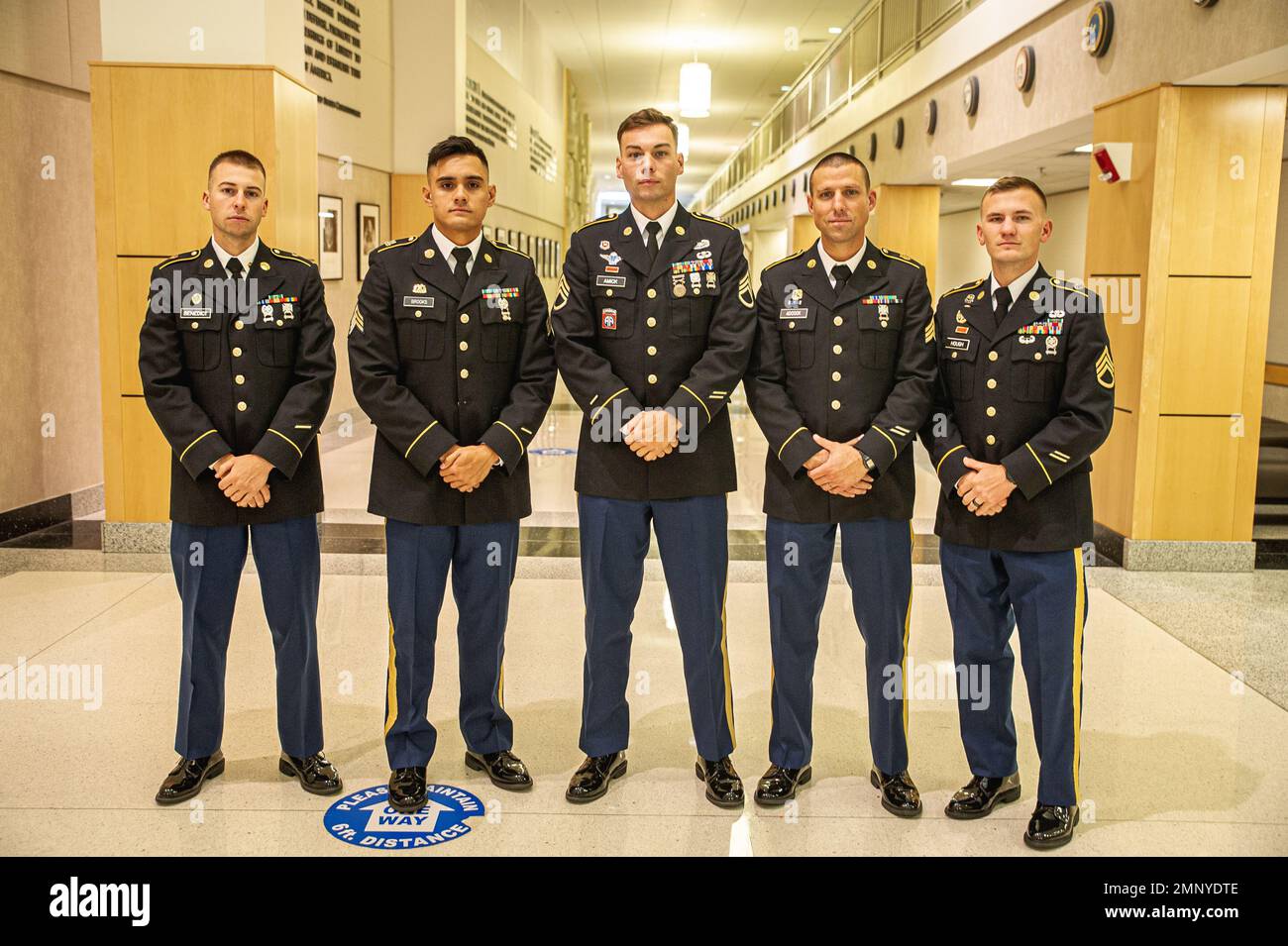 Team Honey Badgers, representing the U.S. Army Reserve, poses for a ...