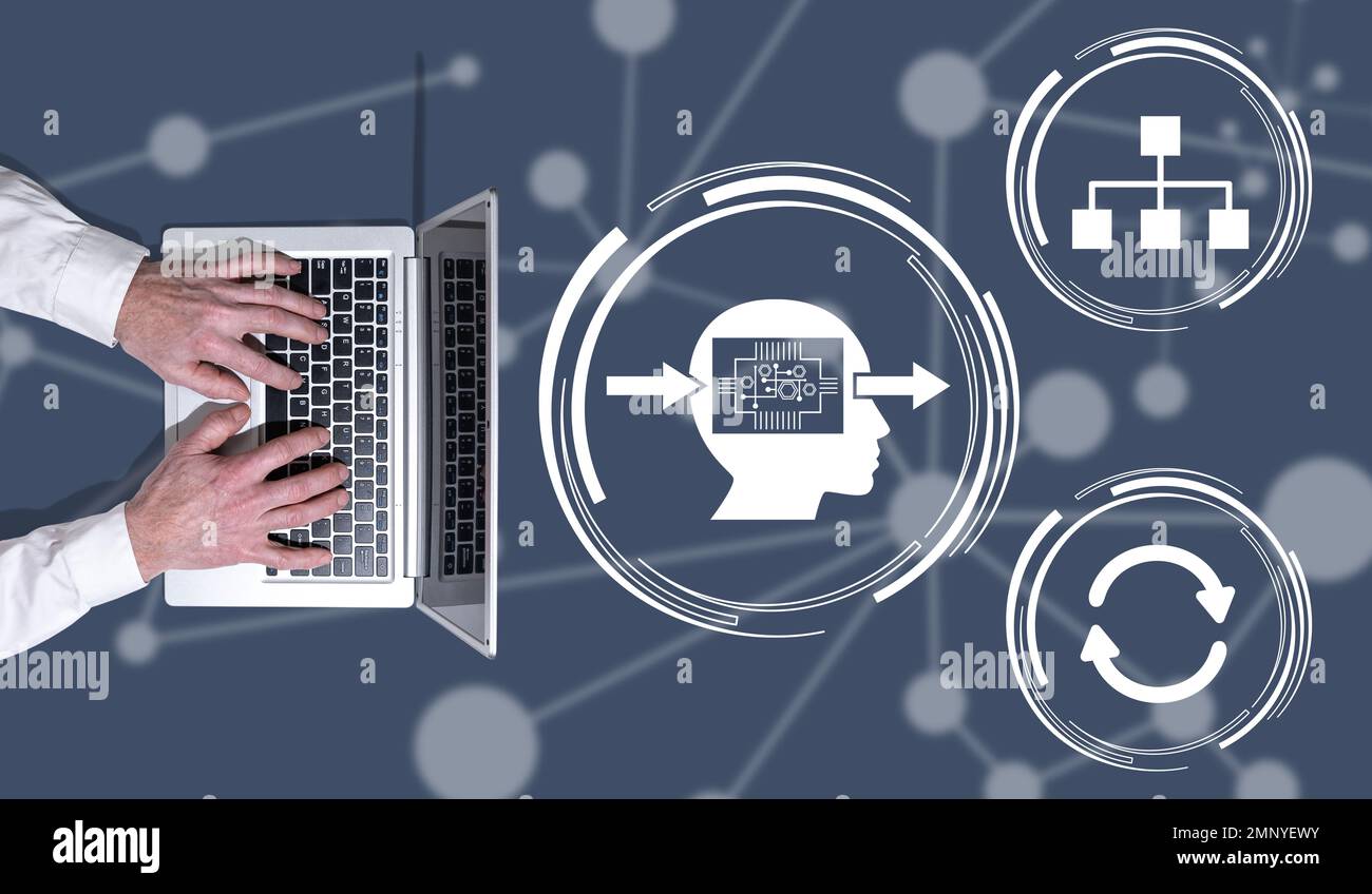 Top view of hands using laptop with symbol of deep learning concept ...