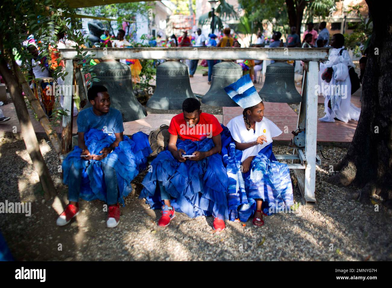 Carnival performers rest at a plaza before the start of a Carnival ...