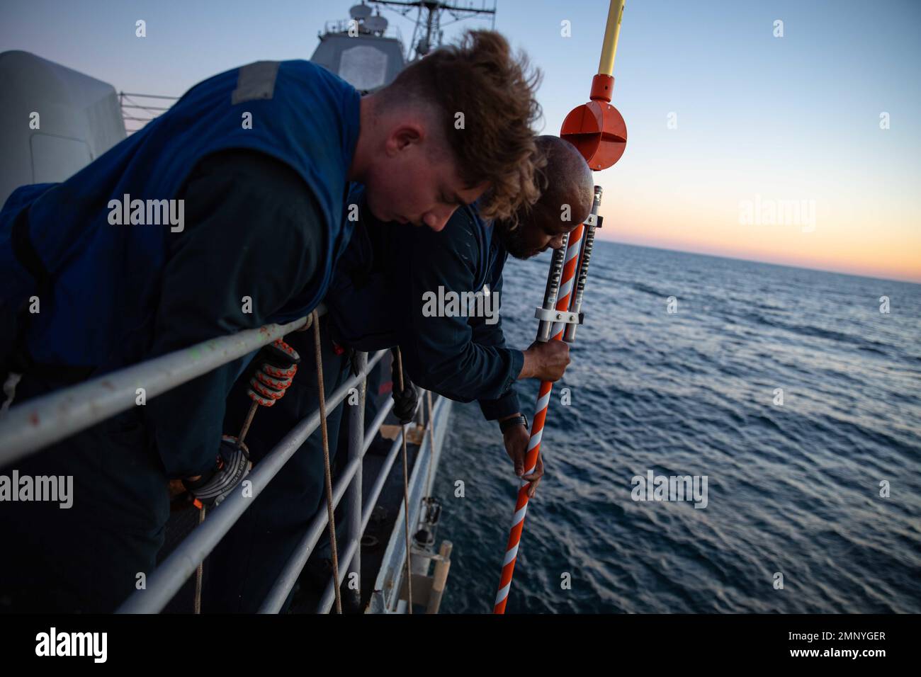 221007-N-LK647-0126 ATLANTIC OCEAN—Seaman Gavin Guenther, foreground ...