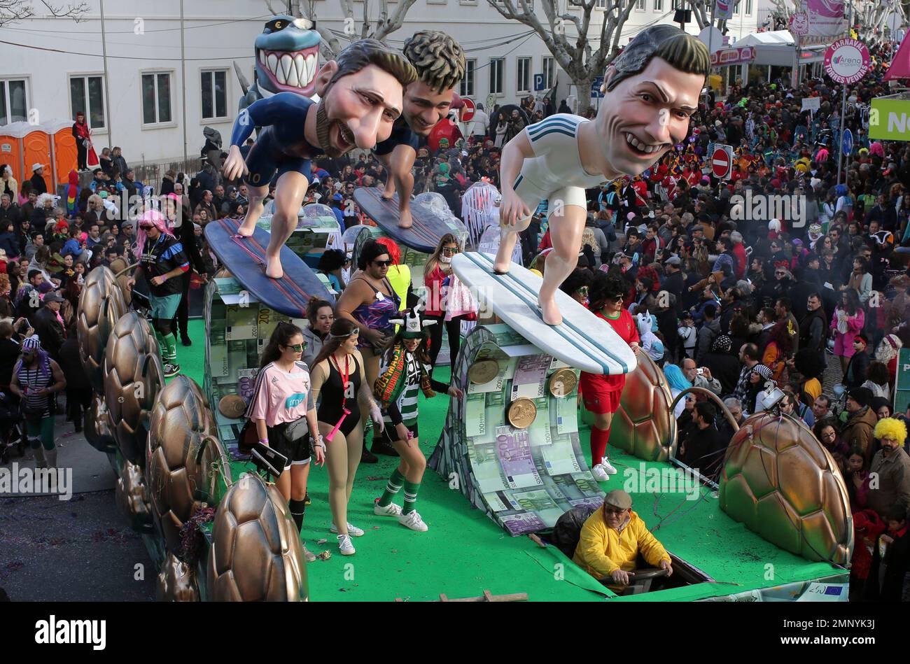 A float with sculptures of soccer players Lionel Messi, Neymar and ...