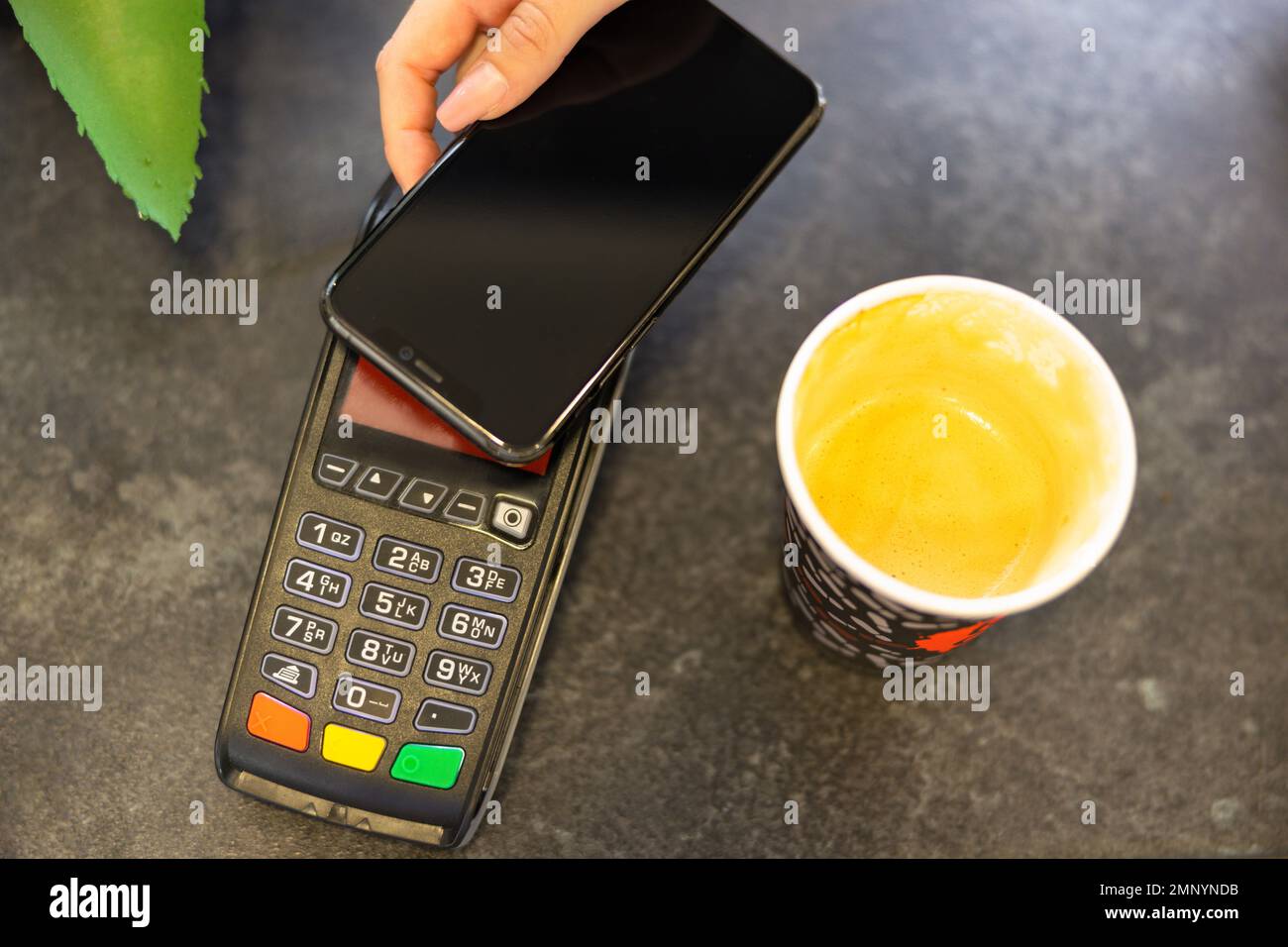 Electronic payments, online payments concept. Bank card inserted to ...