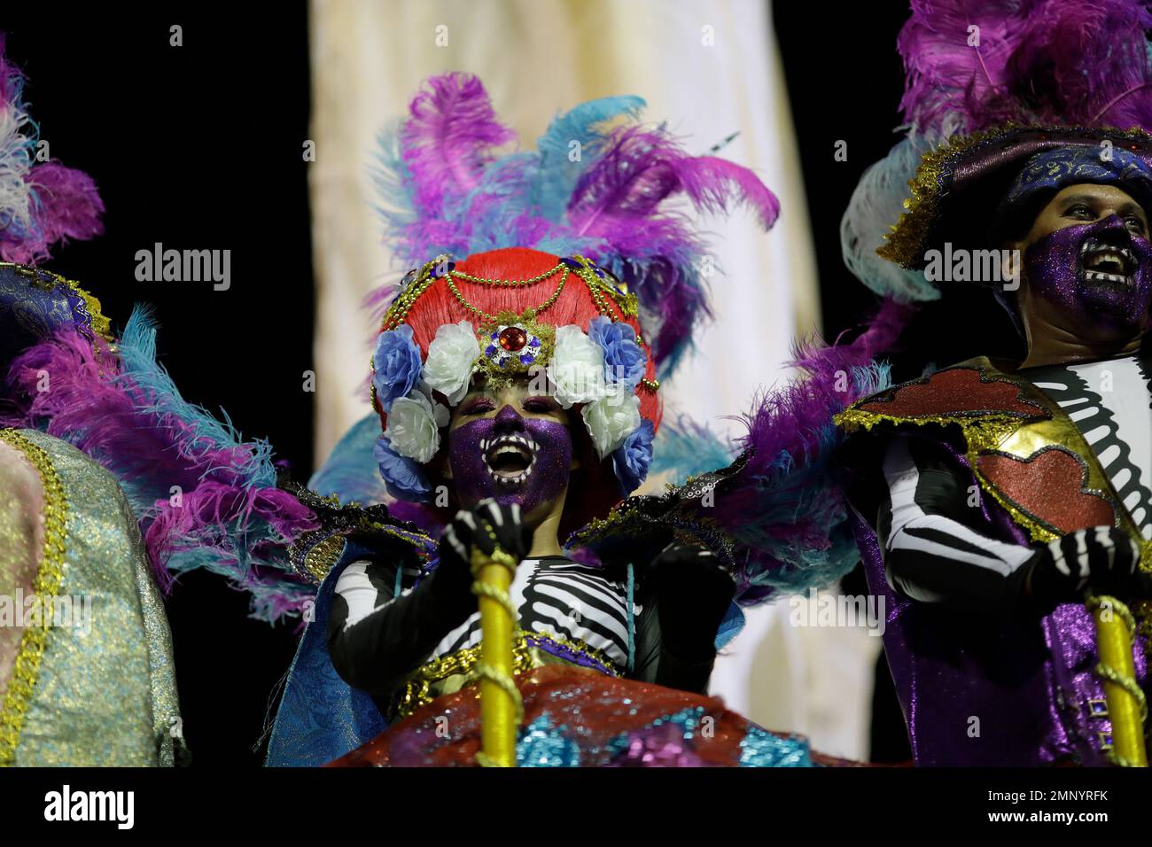 A performer from the Portela samba school parades on a float during ...