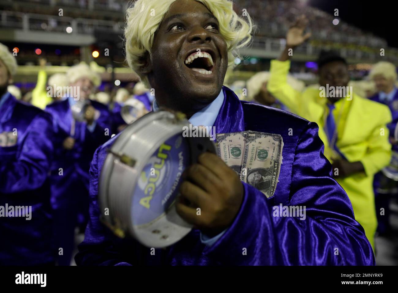 A performer from the Unidos da Tijuca samba school parades during ...