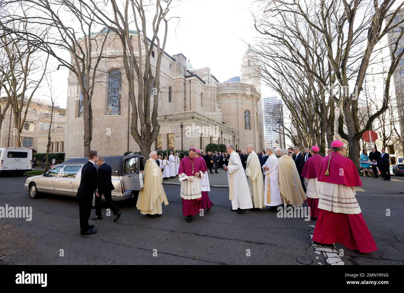 Clergy line-up to bless the coffin of former Gov. John Spellman ...