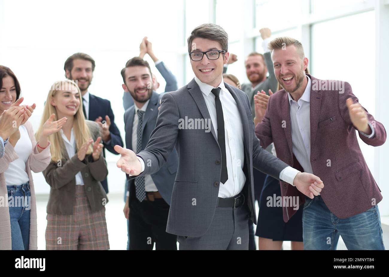 boss and the gleeful business team standing together Stock Photo - Alamy