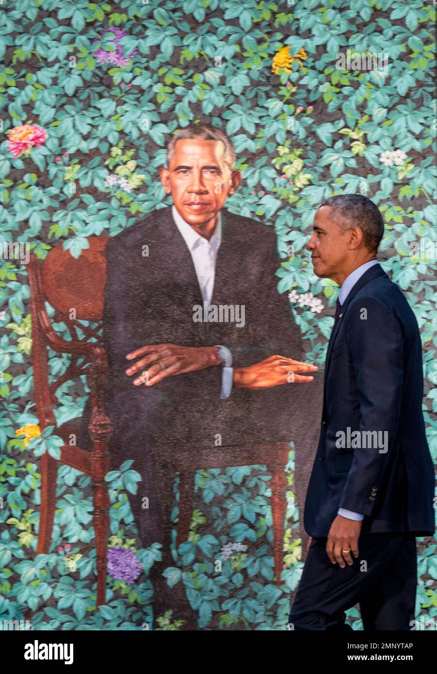 Former President Barack Obama walks past his official portrait by ...