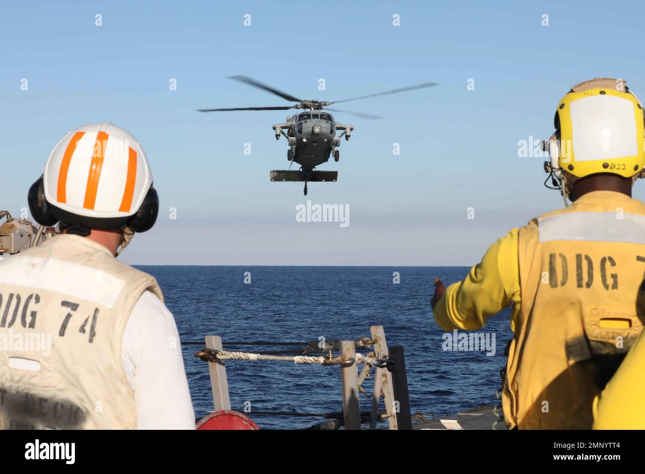 221007-N-AL206-1100 ATLANTIC OCEAN (Oct. 7, 2022) A helicopter prepares ...
