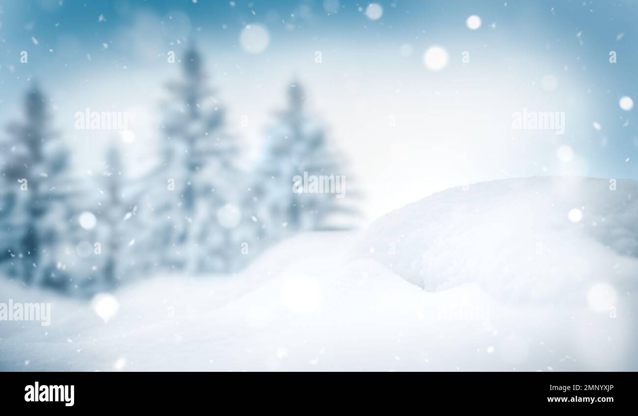 Snow falling light blue background hi-res stock photography and images ...